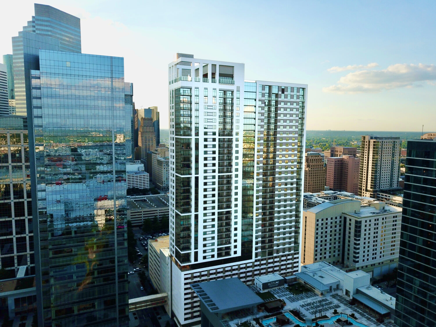 Contemporary Tower Apartments with Rooftop Pool and Downtown Views